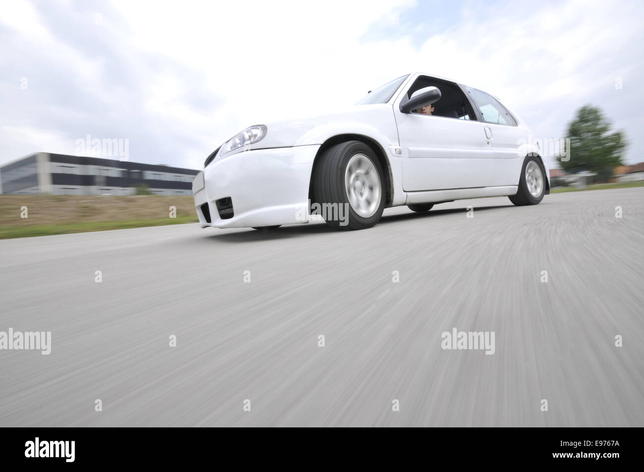 Fast car moving with motion blur Stock Photo - Alamy
