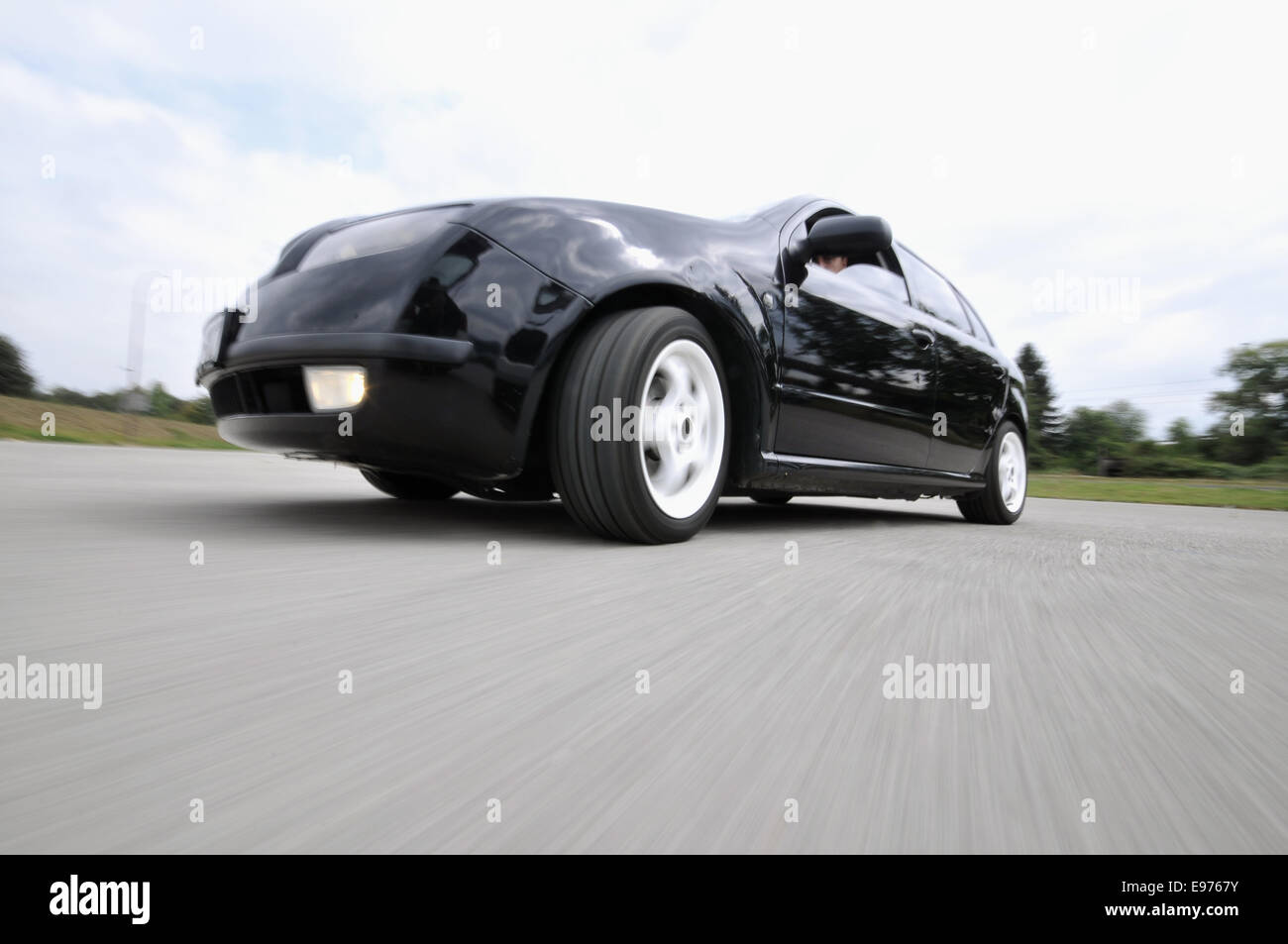 Fast car moving with motion blur Stock Photo - Alamy