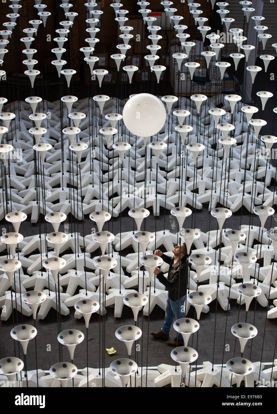 Berlin, Germany. 21st Oct, 2014. Journalist Jan Frankowski throws a ...