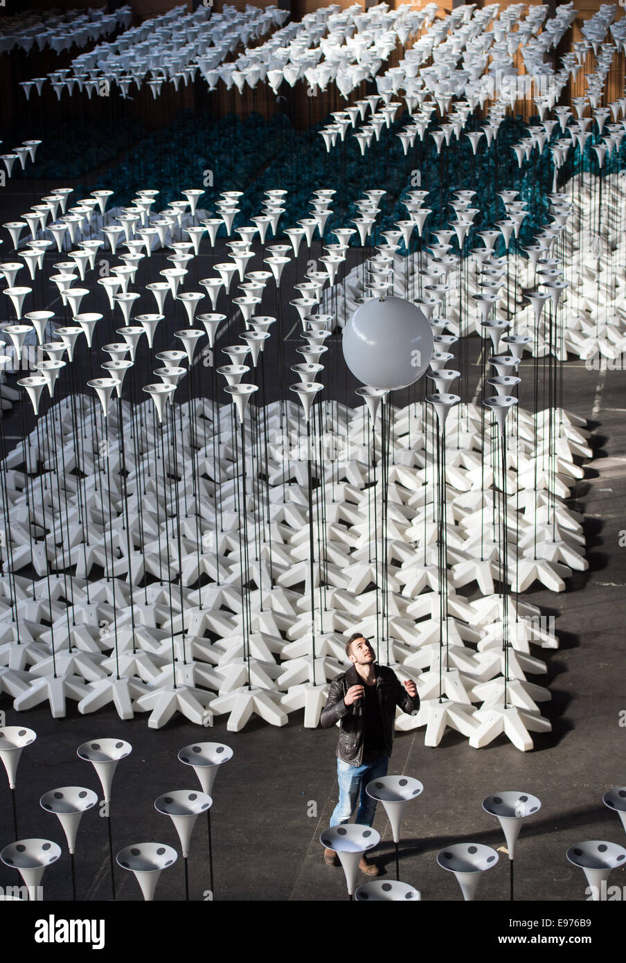Berlin, Germany. 21st Oct, 2014. Journalist Jan Frankowski throws a ...