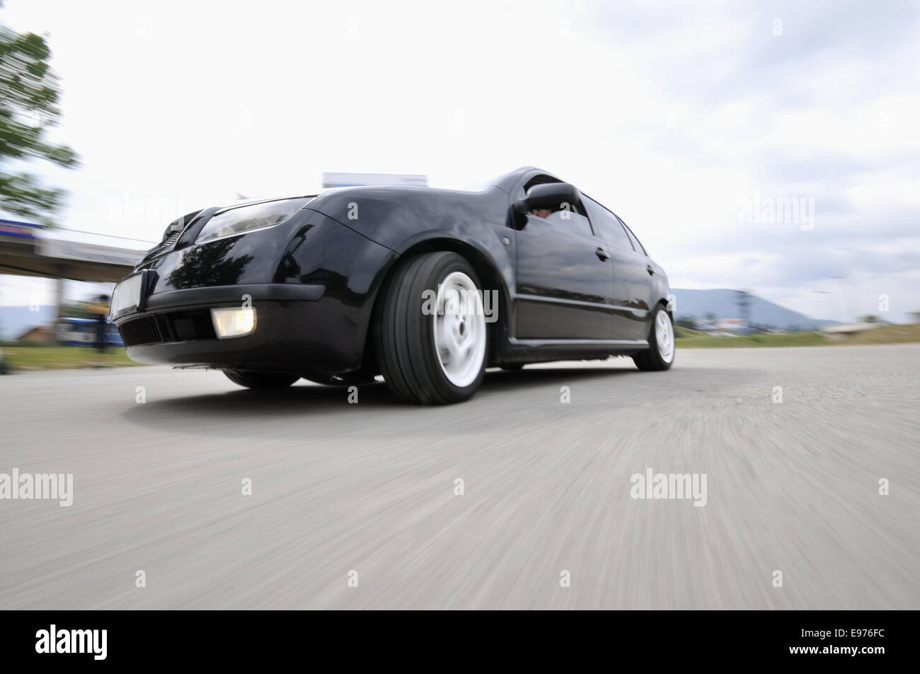 Fast car moving with motion blur Stock Photo - Alamy