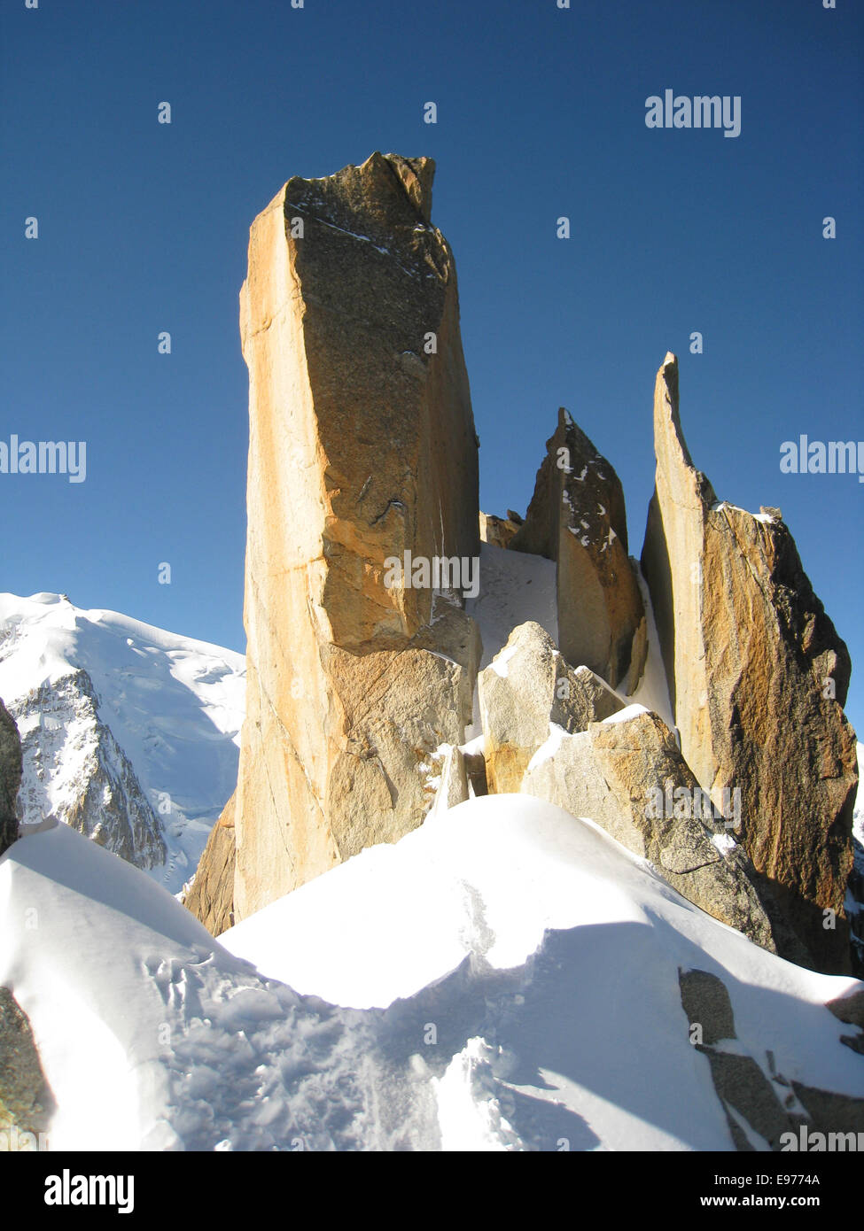 Sheer rock face used by climbers in the high alps. On the route of the ...