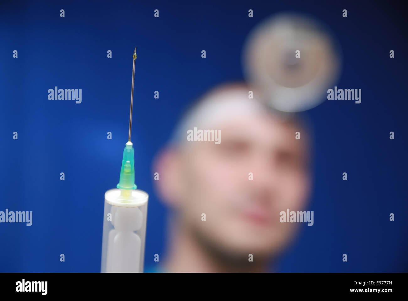 doctor with injection Stock Photo - Alamy