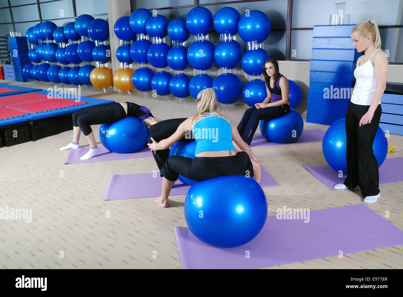 beautiful young girls working out in a gym Stock Photo - Alamy