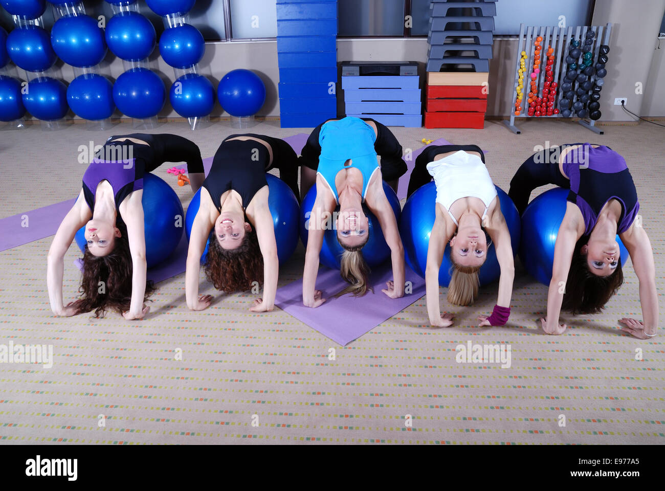 beautiful young girls working out in a gym Stock Photo - Alamy
