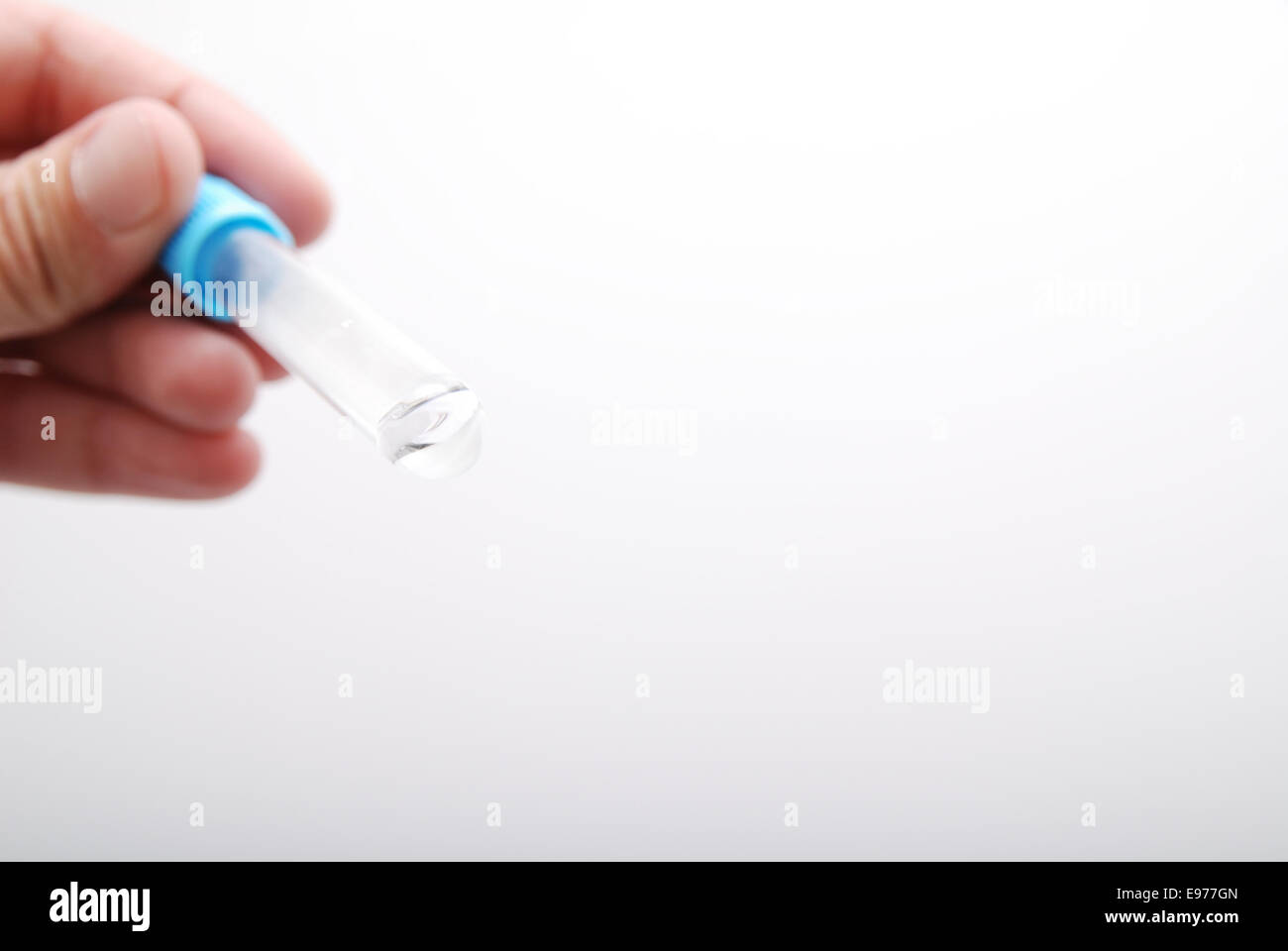 test-tube in woman hand Stock Photo - Alamy