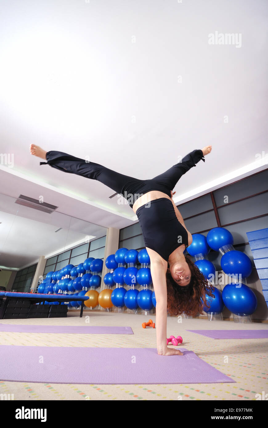 healthy woman exercising in fitness club Stock Photo - Alamy