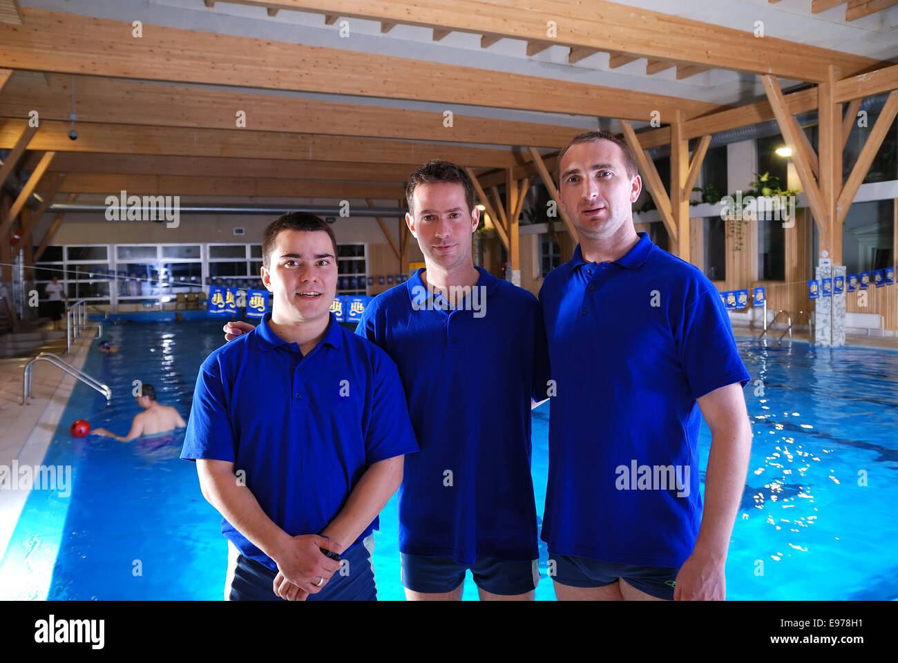 .swimming school instructors at pool Stock Photo - Alamy