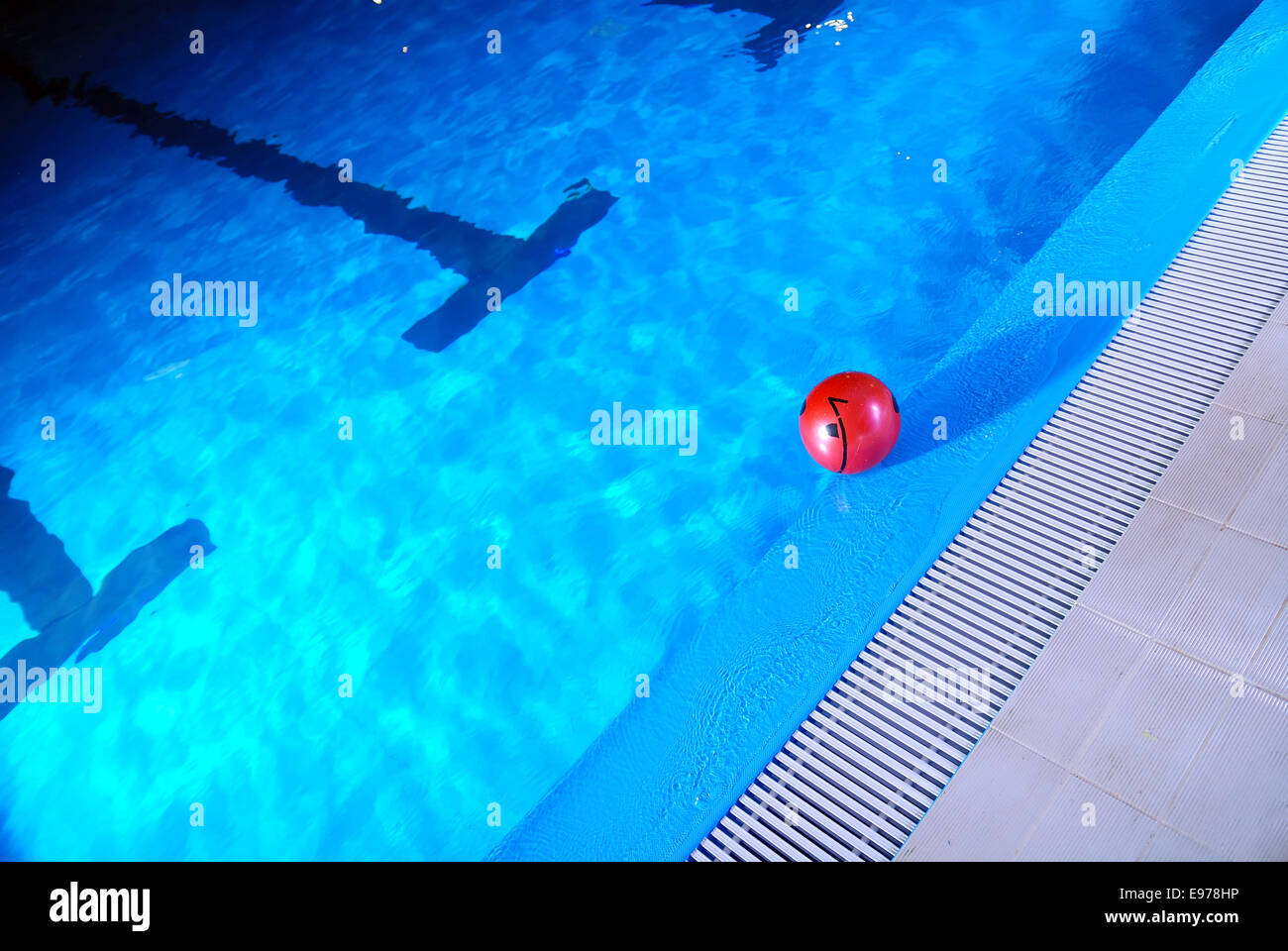 .red ball in swimming pool Stock Photo - Alamy