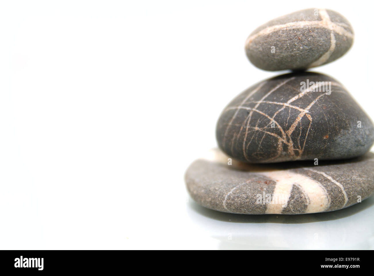 .zen stones with reflection isolated Stock Photo - Alamy