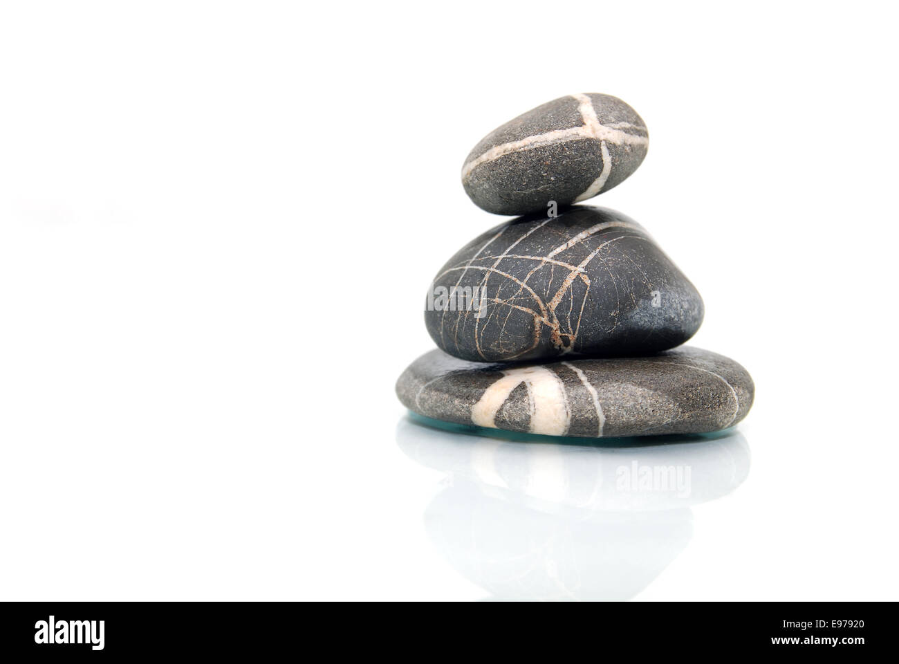 .zen stones with reflection isolated Stock Photo - Alamy