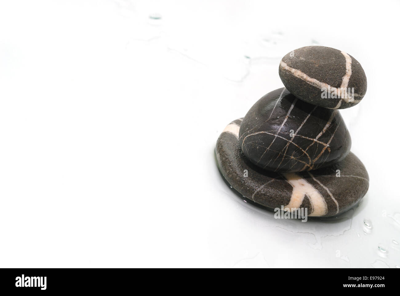 .zen stones with reflection isolated Stock Photo - Alamy