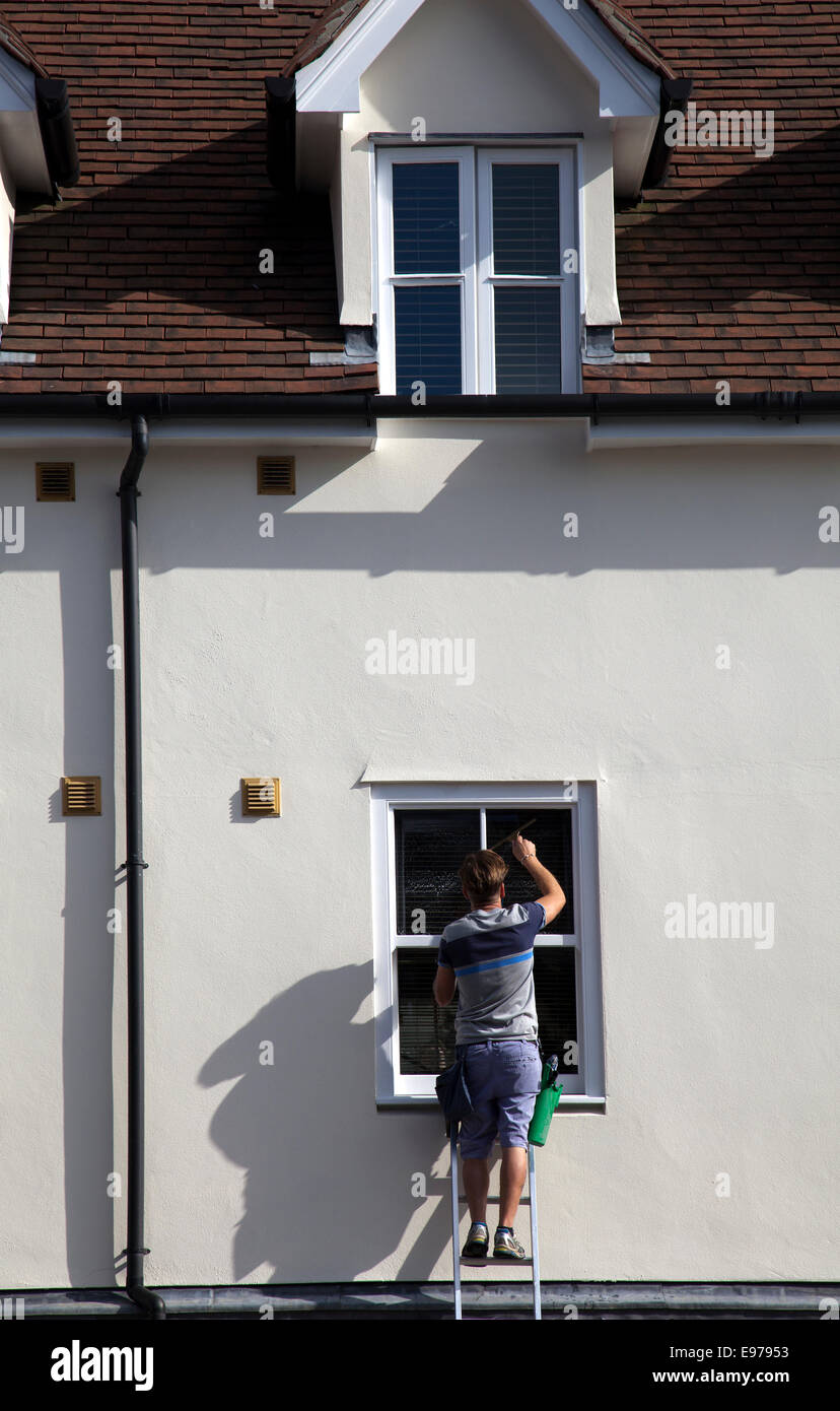Man cleaning windows hi-res stock photography and images - Alamy