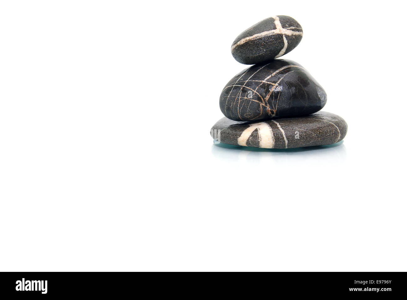 .zen stones with reflection isolated Stock Photo - Alamy