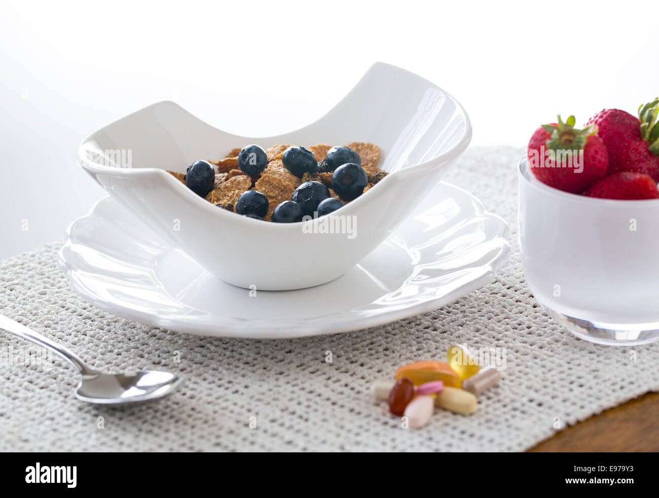 Breakfast of bran flakes blueberries Stock Photo - Alamy
