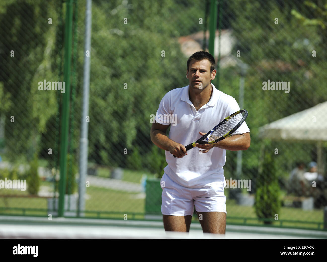 young man play tennis outdoor Stock Photo - Alamy