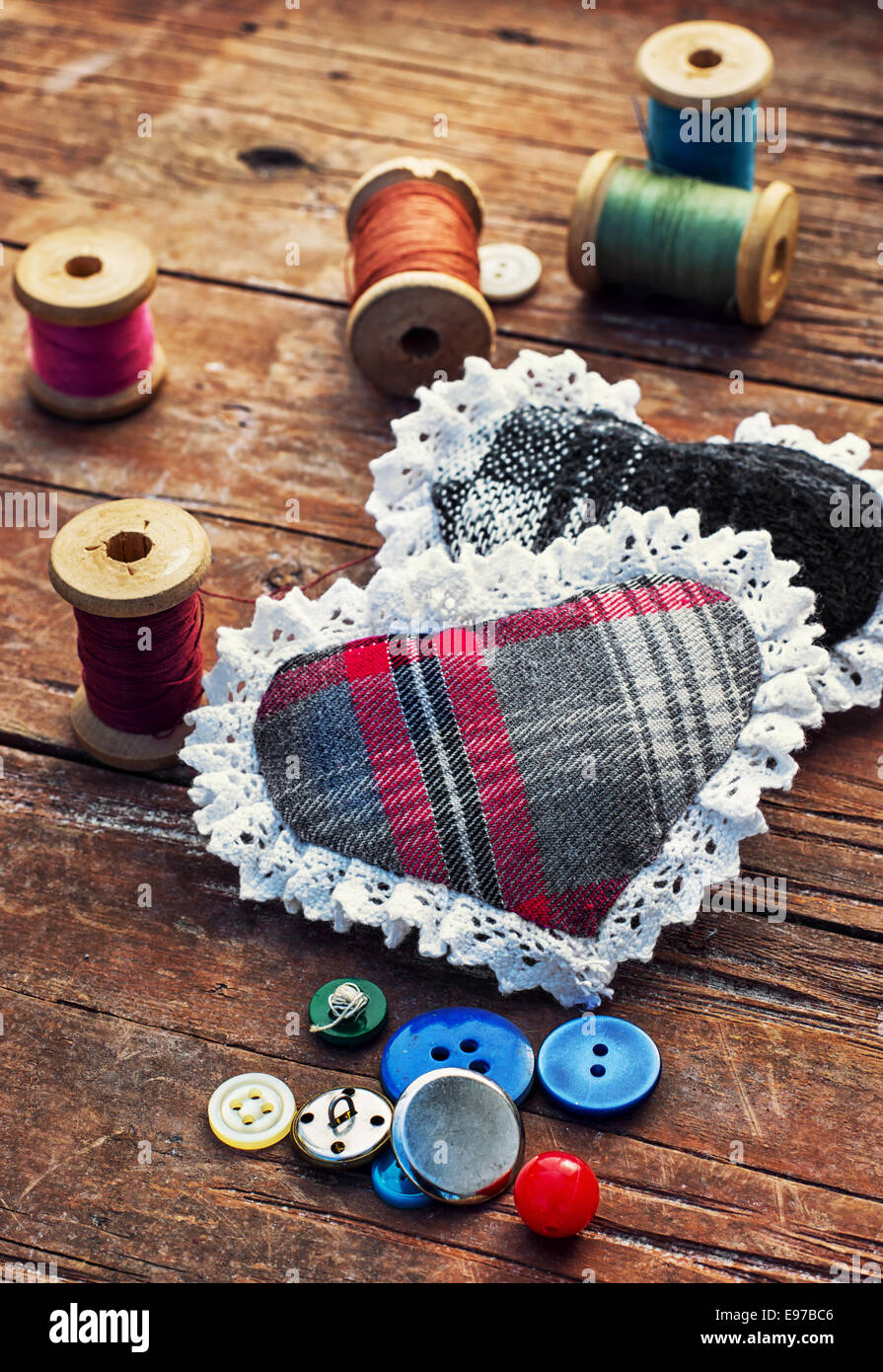 isalnita-heart with spools of thread and buttons Stock Photo - Alamy