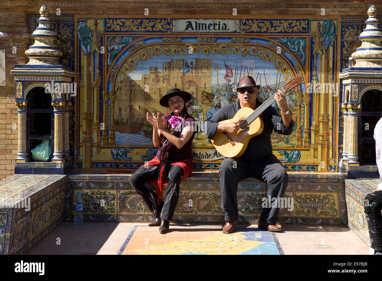 Singers at Plaza de Espania in Seville Stock Photo - Alamy