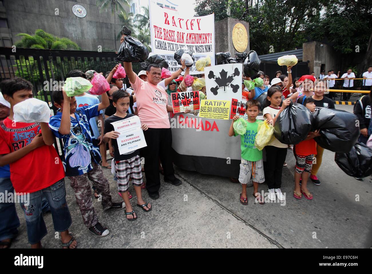 Pasay City, Philippines. 21st Oct, 2014. Environmental activists hold ...