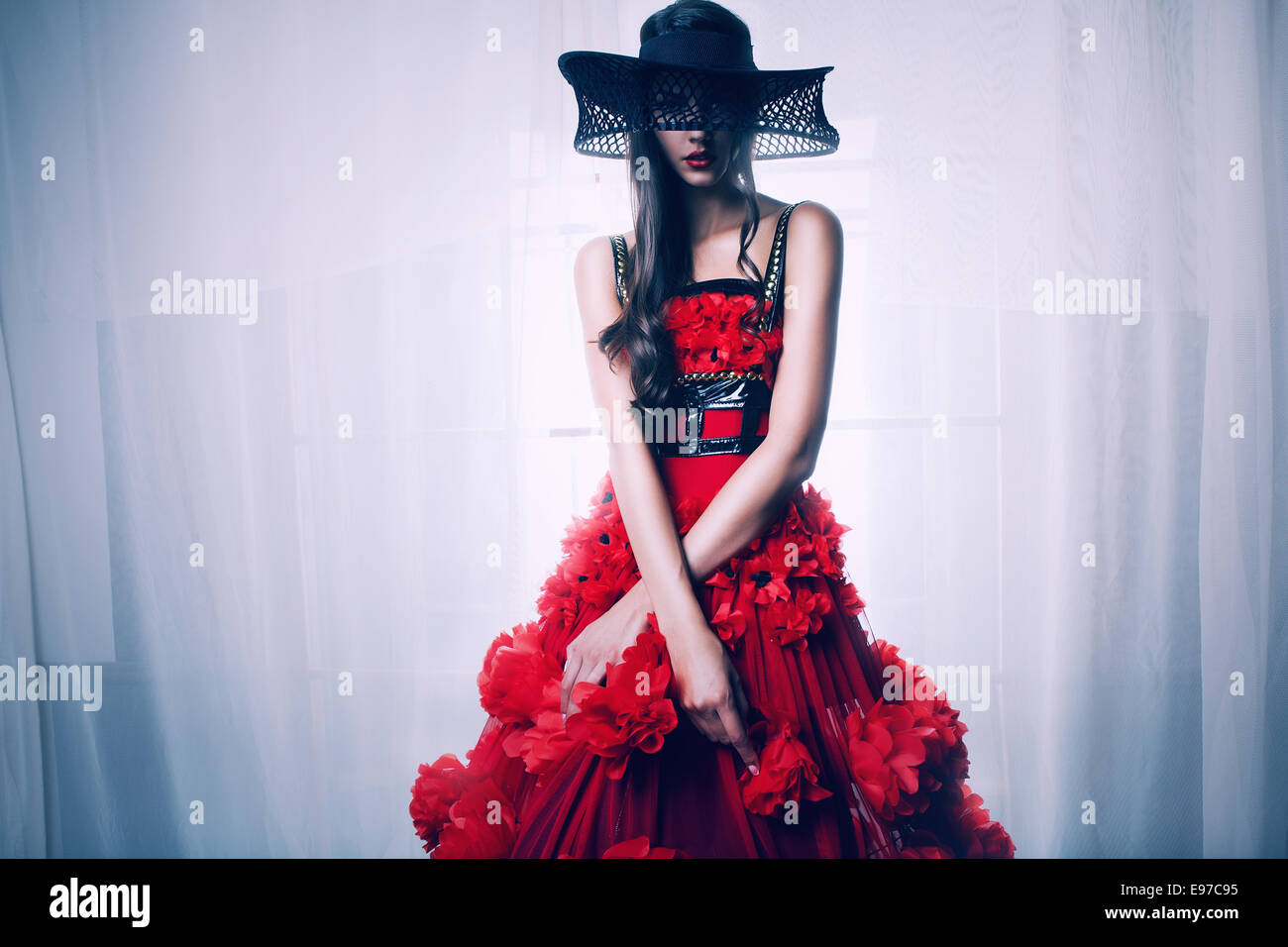 beautiful woman in colourful paint in dark Stock Photo - Alamy