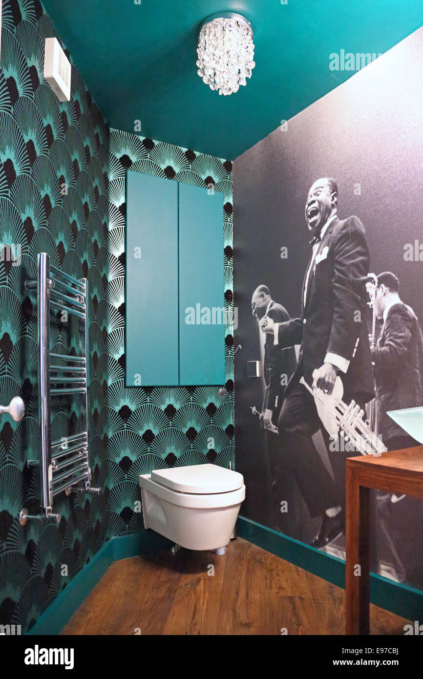 A highly decorated domestic cloakroom in a London house. Features a ...