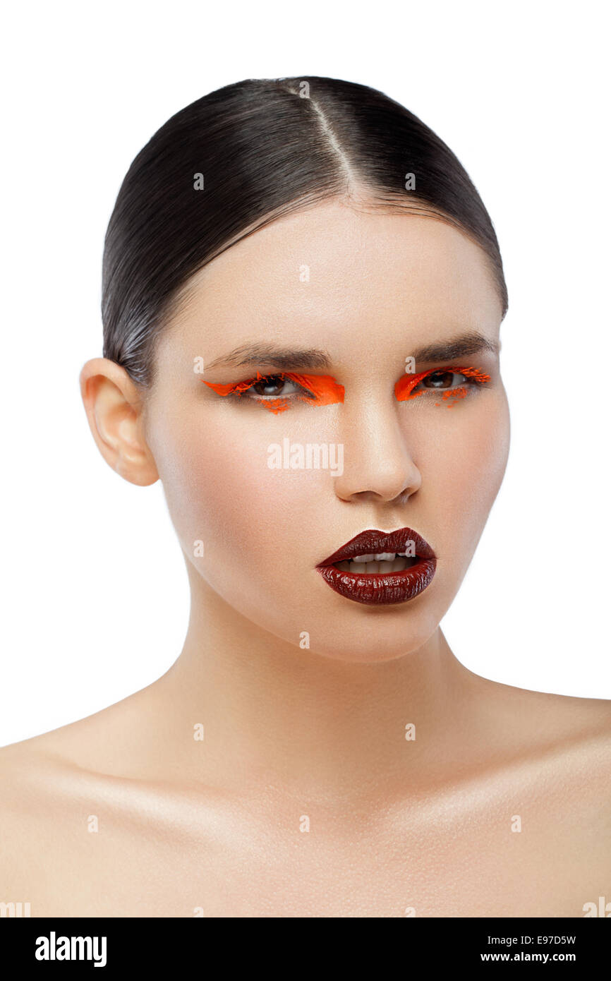 Headshot of a woman with red lips and orange eyeshadows Stock Photo - Alamy
