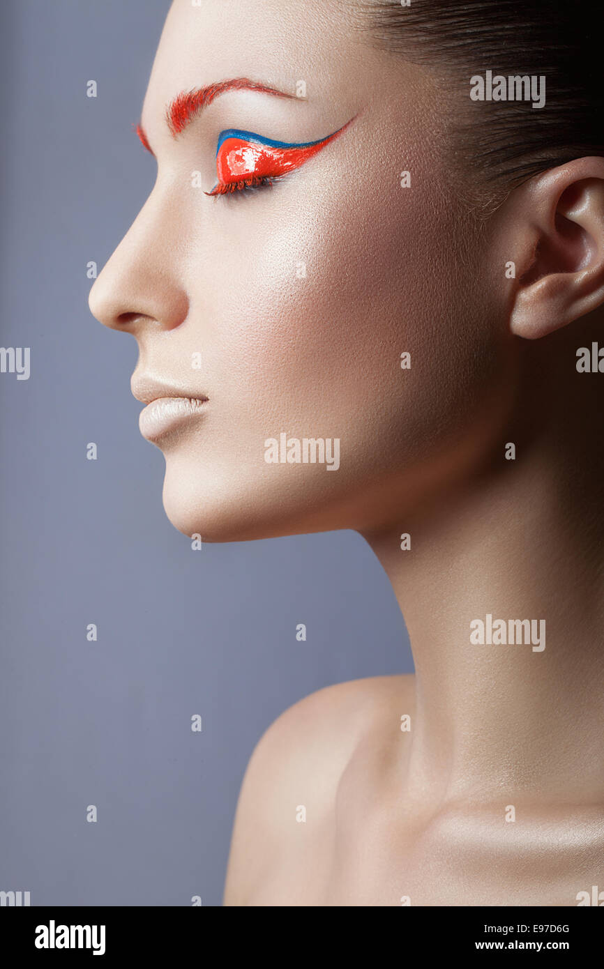 Profile shot of a woman wit dual color make up Stock Photo - Alamy