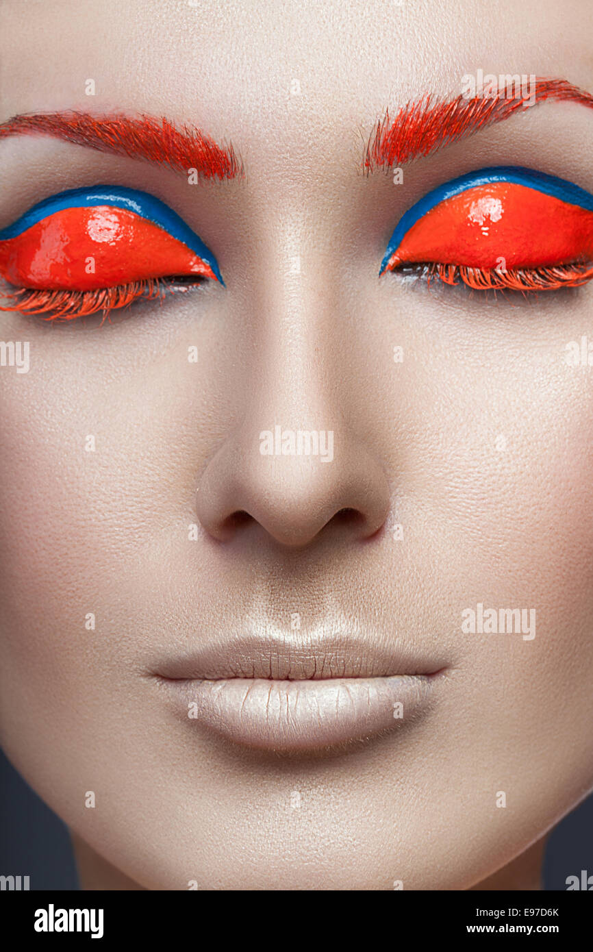 Close up face shot of a woman with dual color make up Stock Photo - Alamy