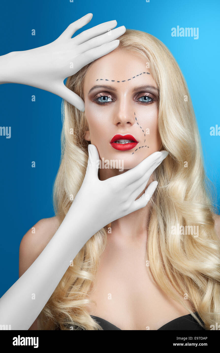 imperious woman in black with red lips Stock Photo - Alamy