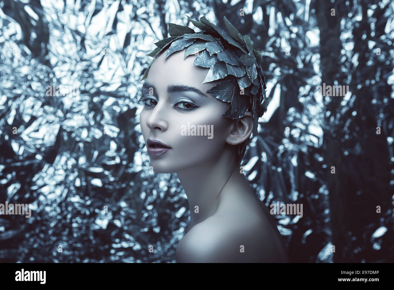 two pretty women in gold glitters Stock Photo - Alamy