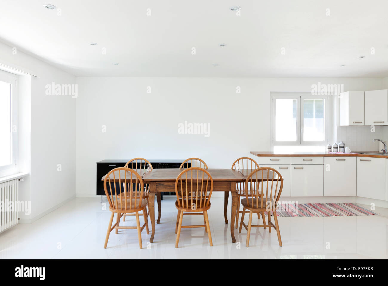 interior house, large modern kitchen, dining table Stock Photo - Alamy