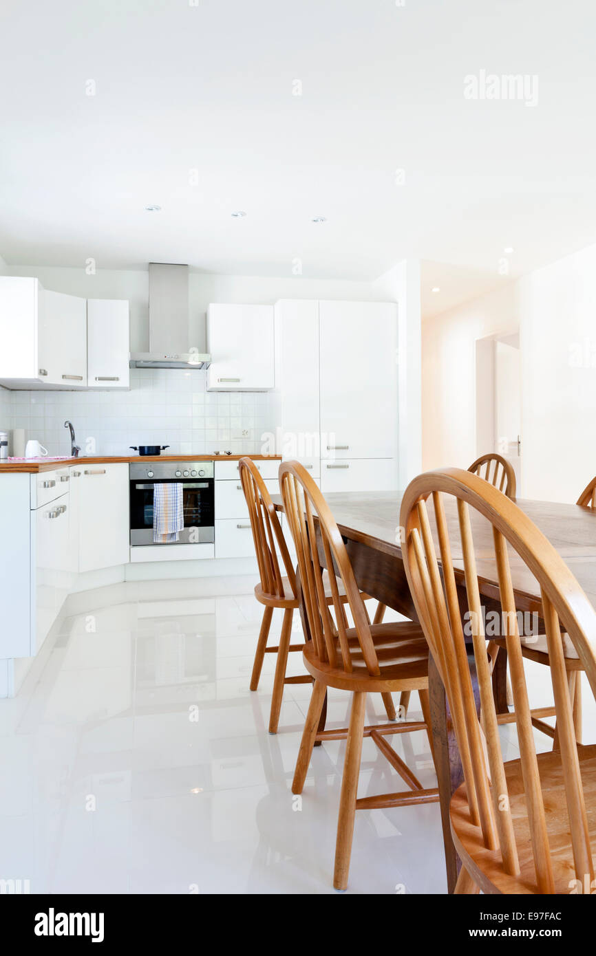 interior house, large modern kitchen, dining table Stock Photo - Alamy