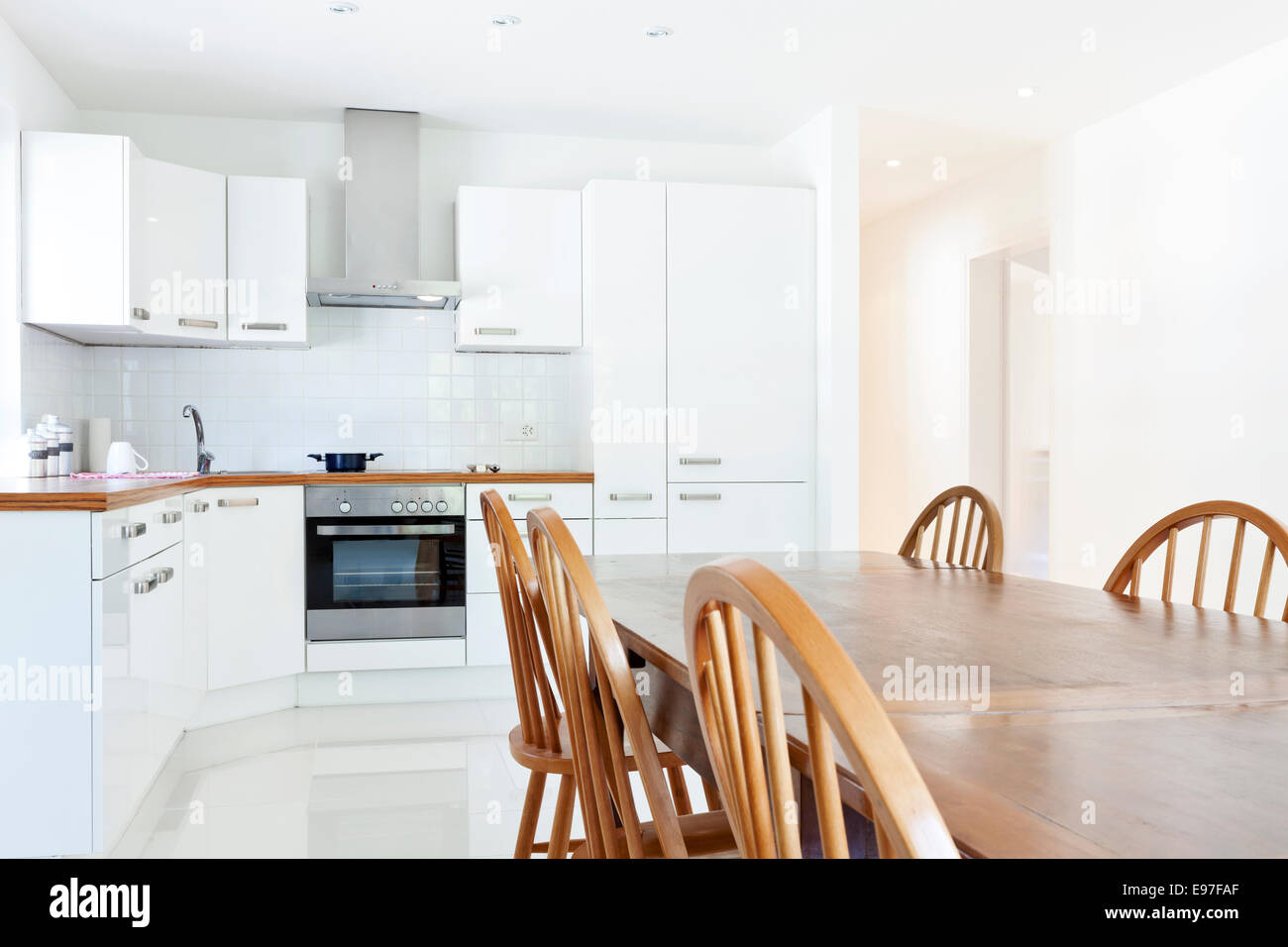 interior house, large modern kitchen, dining table Stock Photo - Alamy