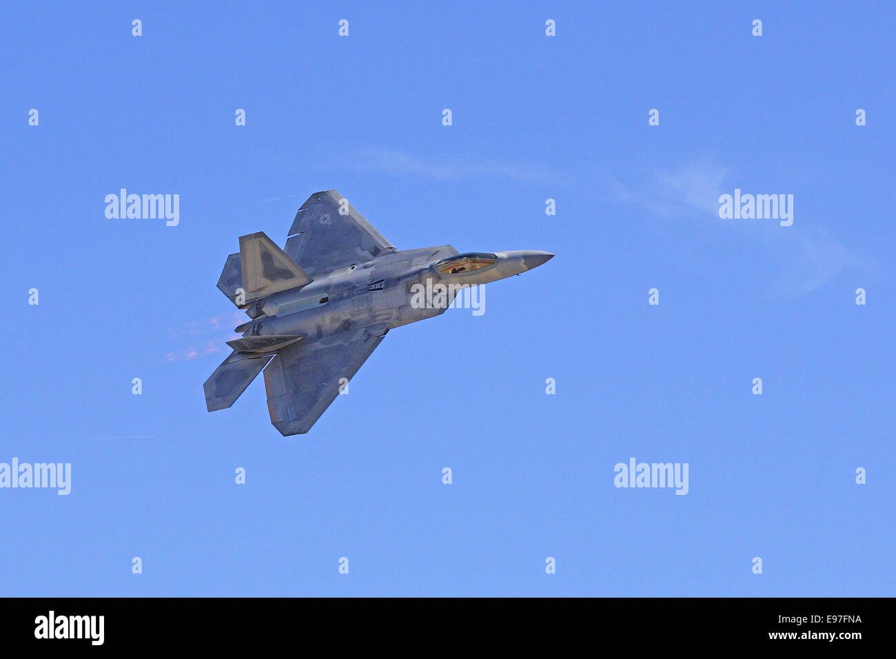 Modern F-22 Raptor US Military Aircraft flying at 2014 Planes of Fame ...