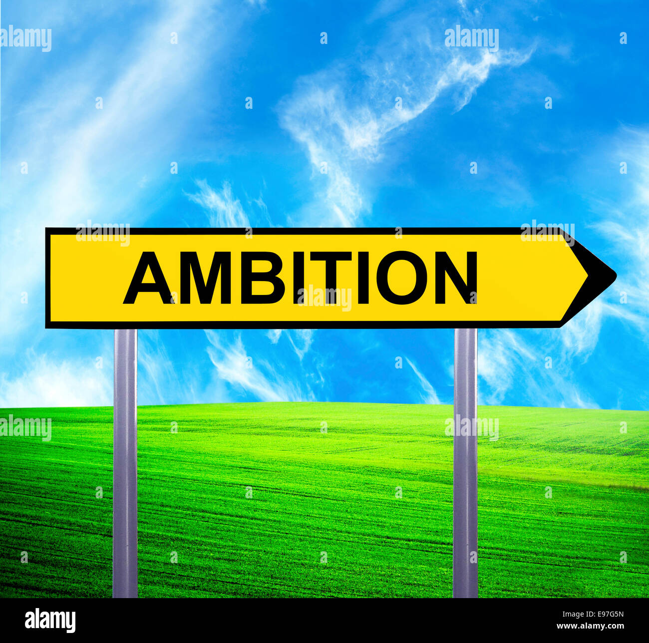 Conceptual arrow sign against beautiful landscape with text - AMBITION ...