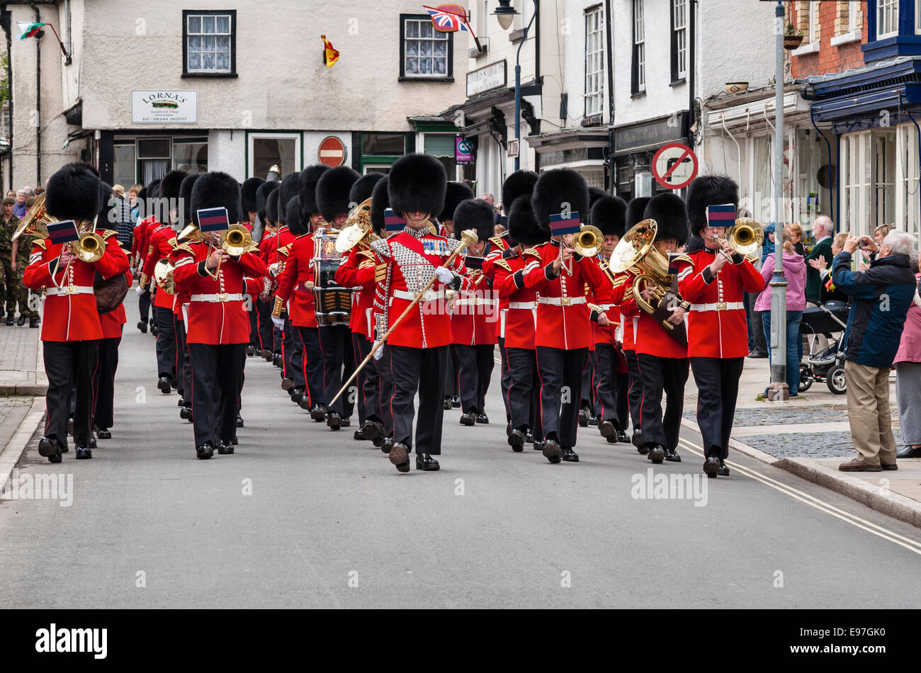 The regimental band of the Welsh Guards marching through the little ...