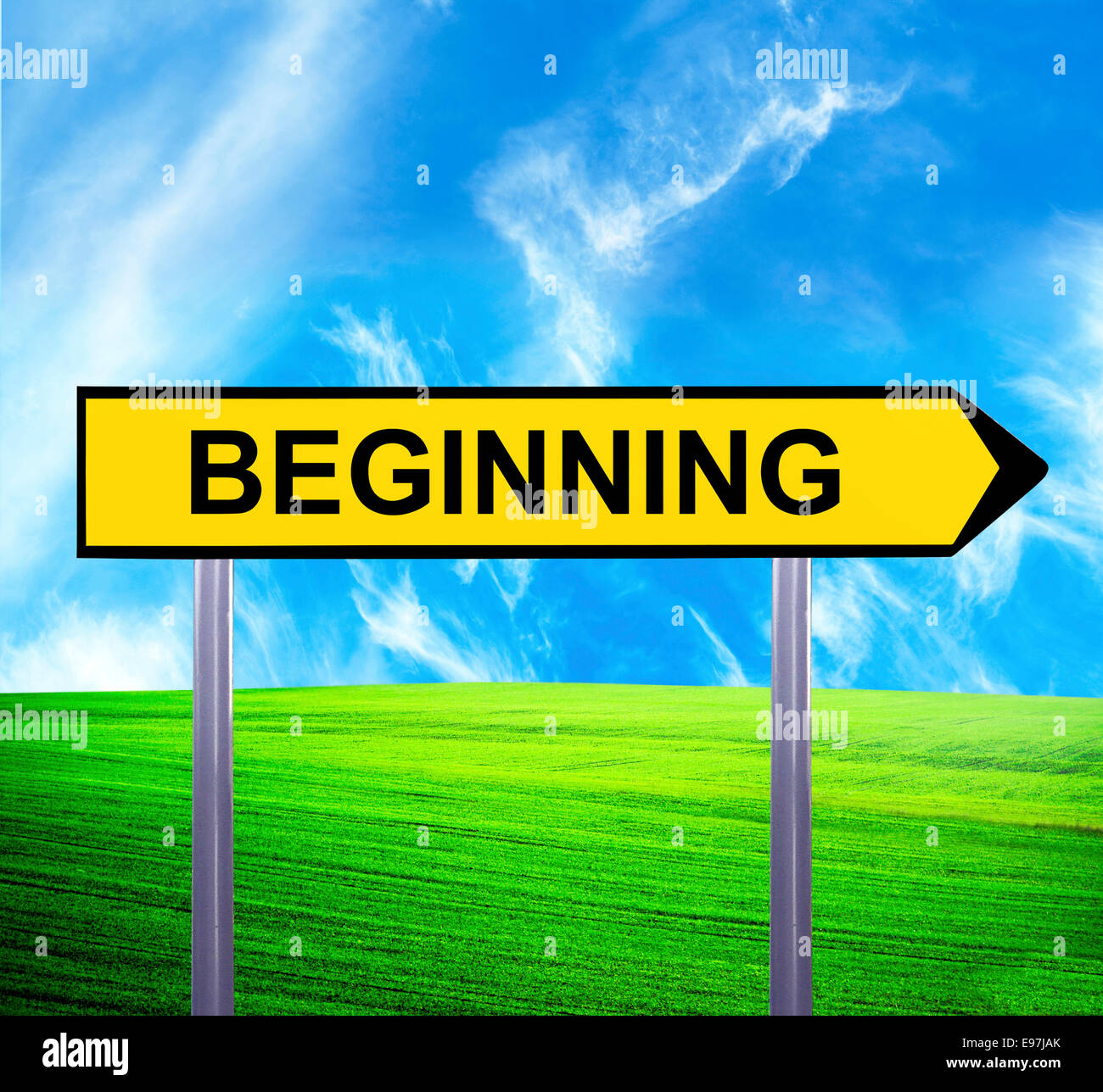 Conceptual arrow sign against beautiful landscape with text - BEGINNING ...