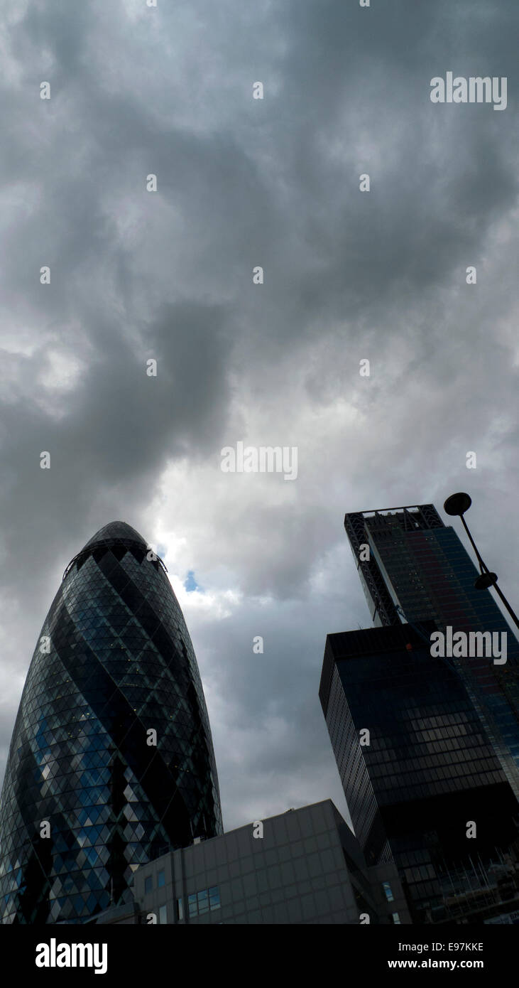 City of London UK. 21st October 2014. Dark storm clouds mix with ...