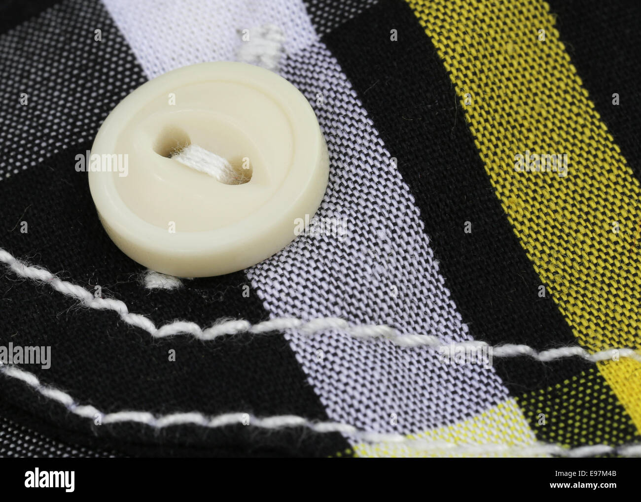 Close up of a button on cloth Stock Photo - Alamy