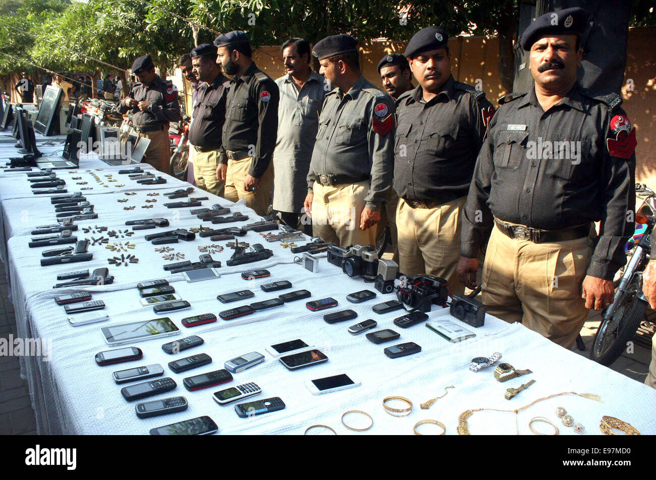 CIA Police Lahore officials are exposing recovered material consisting ...