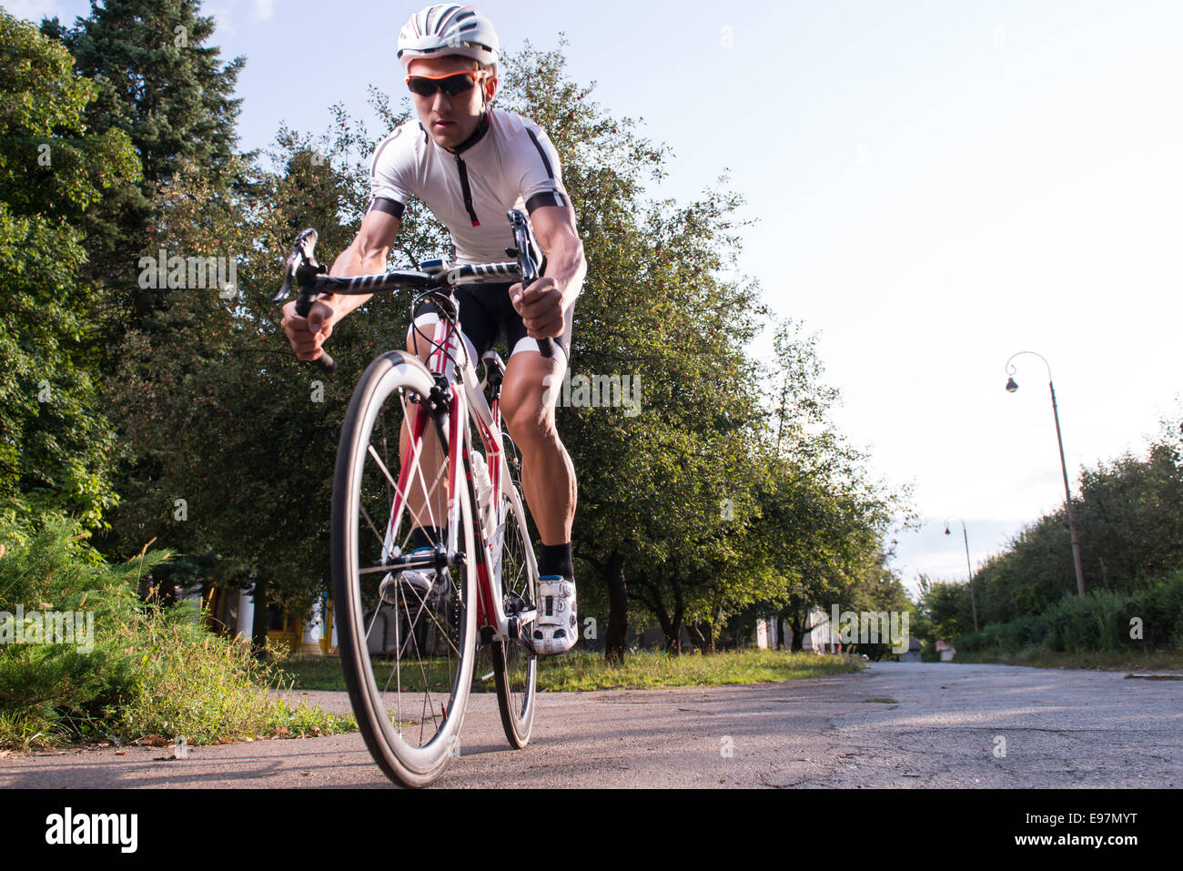 Man riding a bike Stock Photo - Alamy