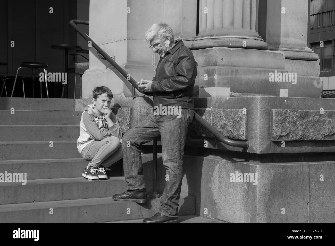 Father on phone with son Stock Photo - Alamy