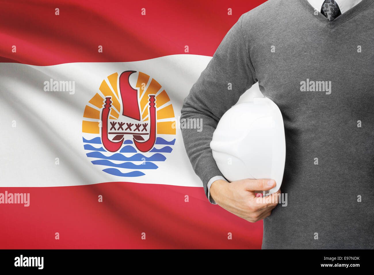 Engineer with flag on background - French Polynesia Stock Photo - Alamy