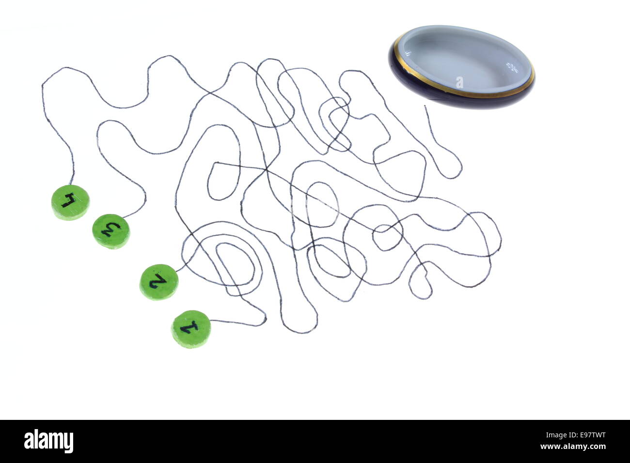 Labyrinth game basket with four routes Stock Photo - Alamy