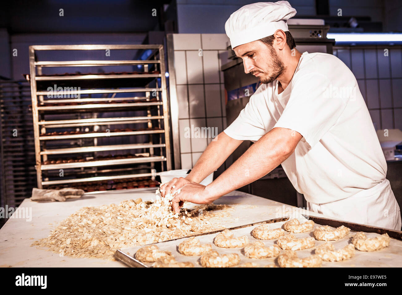 Baker making cookies hi-res stock photography and images - Alamy