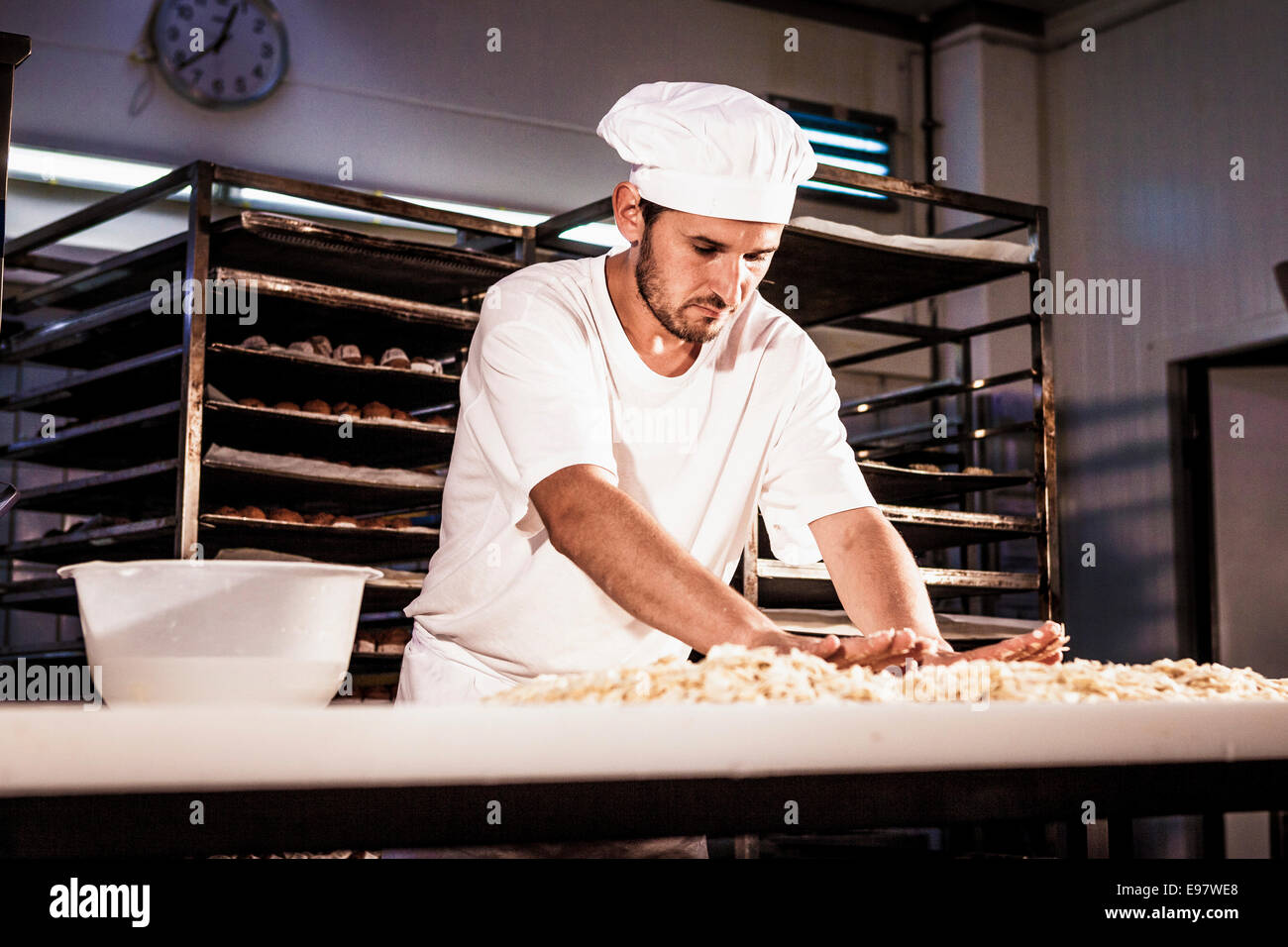 Confectioner making almond cookies Stock Photo - Alamy