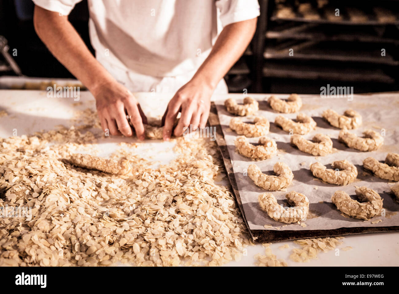 Confectioner making almond cookies Stock Photo - Alamy