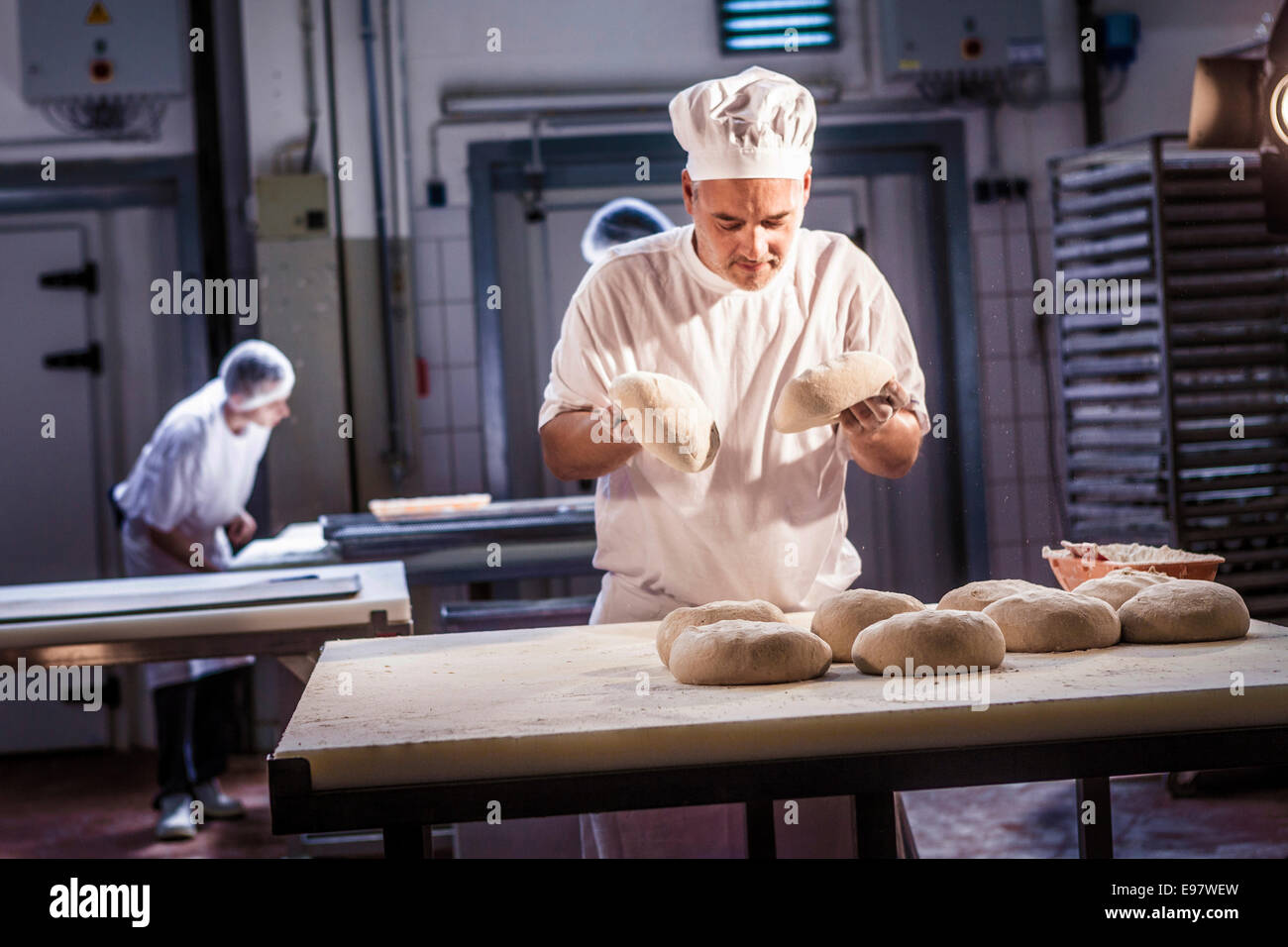 Baker making bread hi-res stock photography and images - Alamy