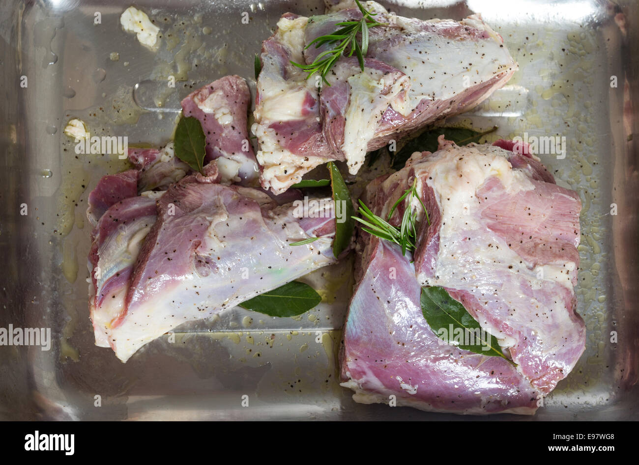 Leg of lamb with bay leaves hi-res stock photography and images - Alamy