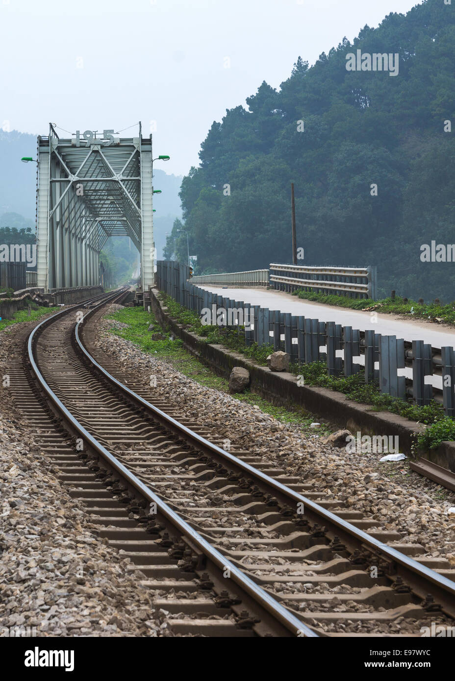 Typical metal train bridge over river in Vietnam Stock Photo - Alamy